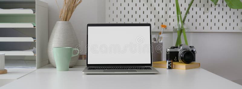 Close Up View of Modern Office Desk with Blank Screen Laptop, Camera ...