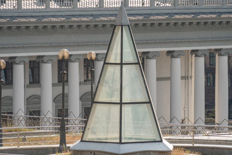 Close-up View of a Modern, Triangular Glass Structure Atop an Elevated ...