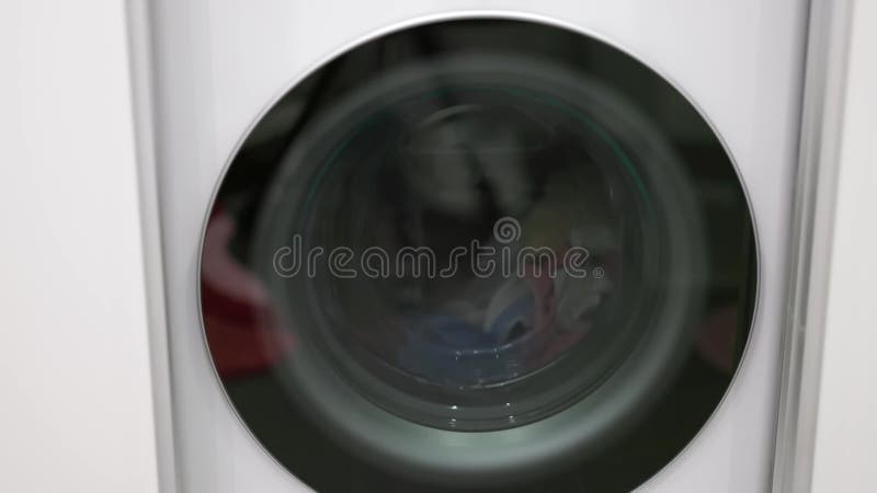 Close Up View of a Modern Washing Machine in Operation, Showcasing the ...