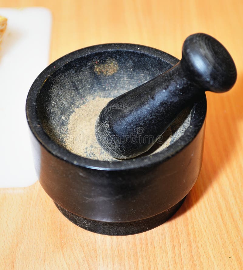 Close Up View of a Mortar Spice Masher Stock Photo - Image of garlic ...