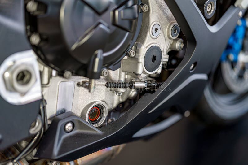 Close-up View of a Motorcycle Engine Component in a Workshop ...