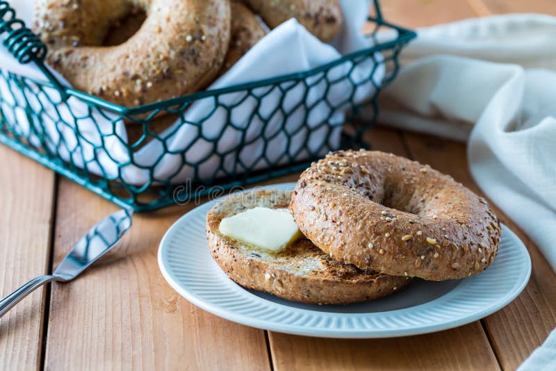 Multi Grain Bagel and Butter. Stock Photo - Image of fibre, gluten ...
