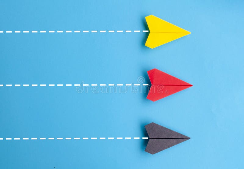 Close Up View of Multicolored Paper Airplane on Blue Background ...