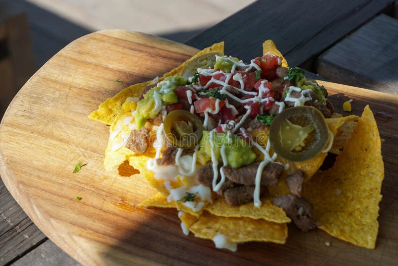 Close Up View of Nachos on the Table. Stock Image - Image of cooking ...