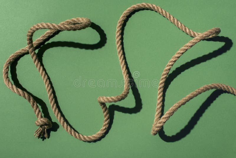 Close-up View of Nautical Rope with Knots and Shadow Stock Image ...