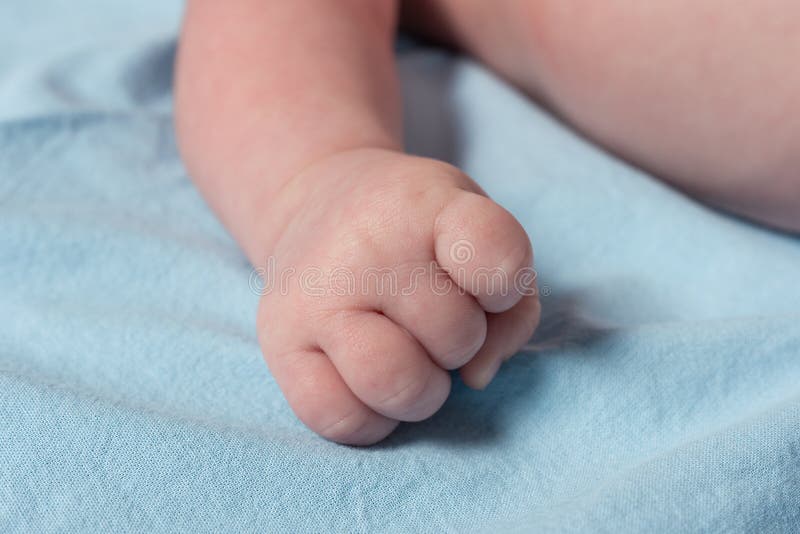 Close Up View of Newborn Baby Hand on a Bed Stock Image - Image of ...