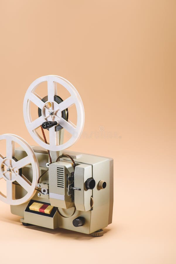 Close Up View of Old Film Projector on Beige Background Stock Image ...