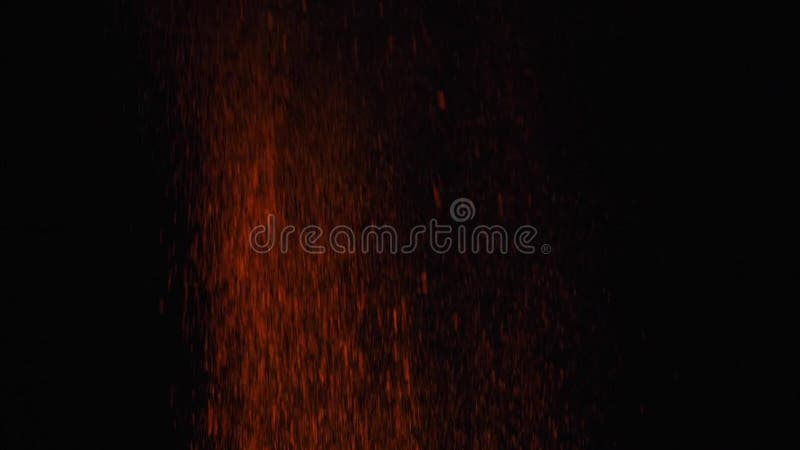 Close-up View of Orange Powder Falling Down from the Top on the Black ...