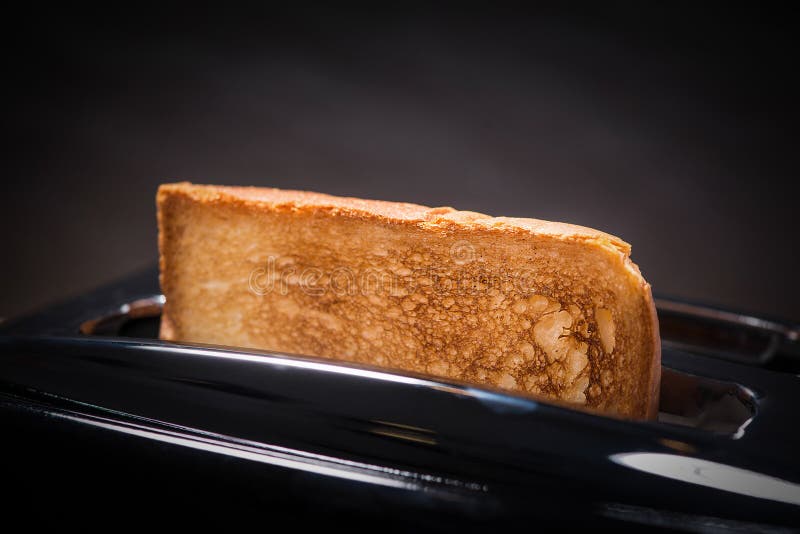 Close-up View of Pastries in a Toasting Device. Fried Toast Slices ...