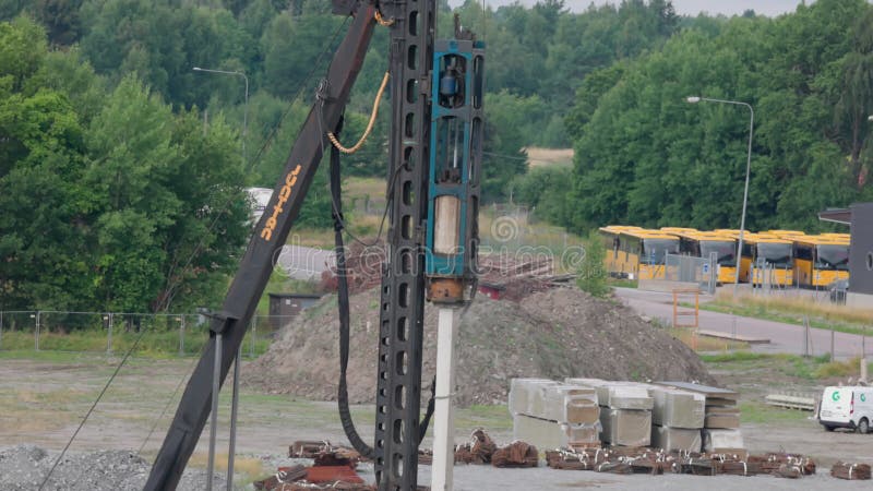 View of Pile Driving Machine Driving Piles into Ground Construction ...