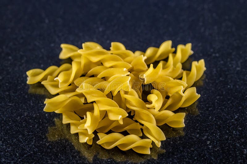 A Close Up View of a Pile of Pasta Twirls Stock Image - Image of ...