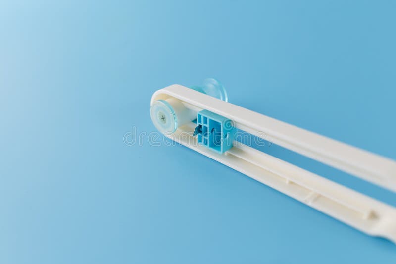 A Close-up View of a Plastic Circle Cutter Device with a Small Blade ...