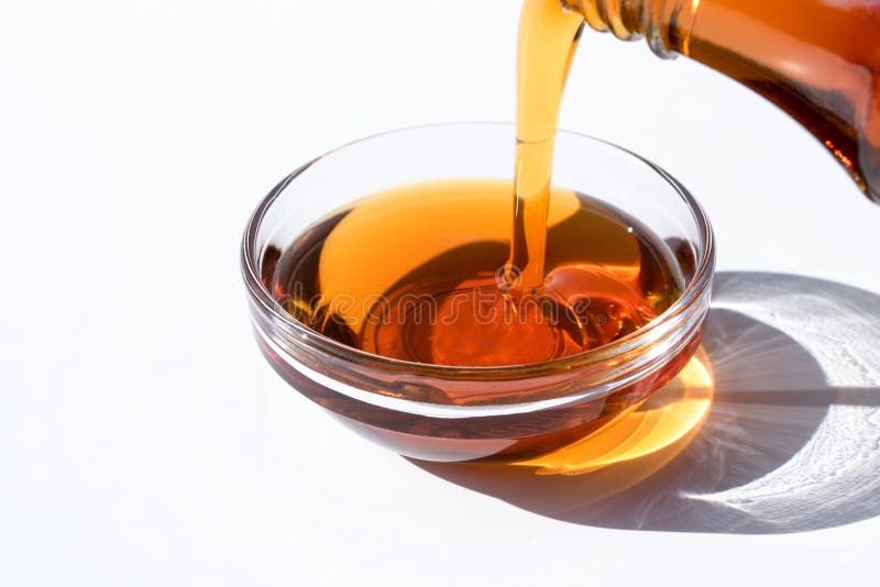 Pouring Maple Syrup in a Bowl Stock Photo - Image of ingredient, motion ...