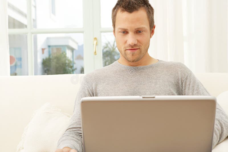 Close Up View of Professional Man with Laptop and Smart Phone at Home ...