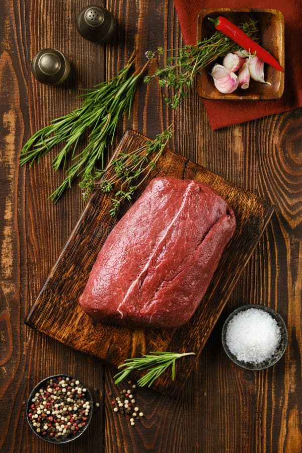 Close-up View of Raw Fresh Beef Flat Iron Steak on Wooden Table Stock ...
