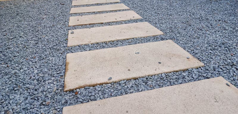 The Rectangular Path is Made of Cement, with Gravel in the Garden Stock ...
