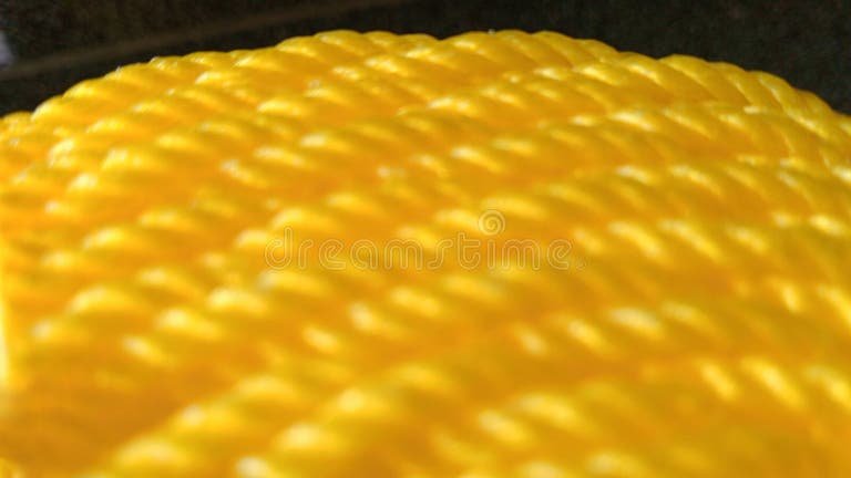 Close Up View of a Roll of Yellow Nylon Rope. Yellow Plastic Rope ...