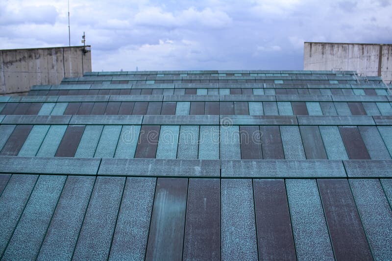 Close-up View of the Rooftop of Building with the Blue Sky and Clouds ...