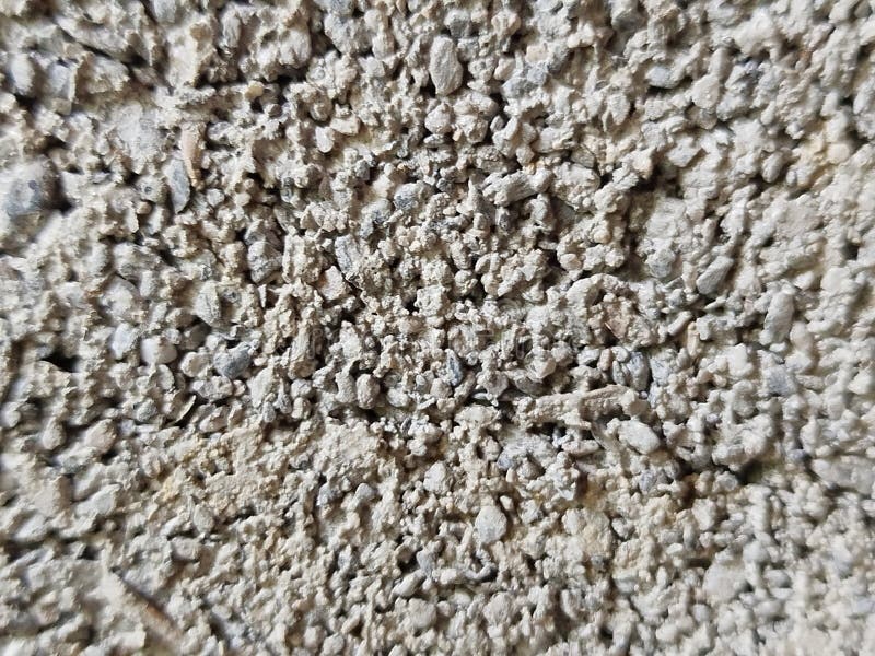 A Close-up View of a Rough, Textured Concrete Surface—gritty, Raw, and ...