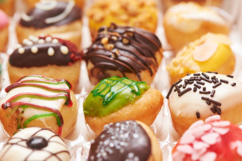 Close-up View Rows of Doughnuts in a Box Stock Photo - Image of sticky ...