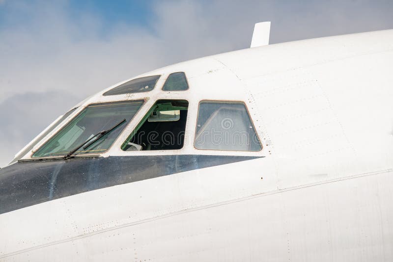 Close Up View of the Side of a Passenger Plane in the Sky Stock Photo ...