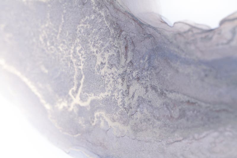 A Close-up View of a Silver Ink Swirl Against a White Background ...