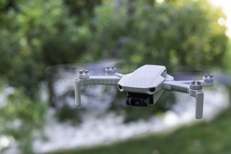 Close Up View of Small Drone Flying Being Controlled by Human from ...