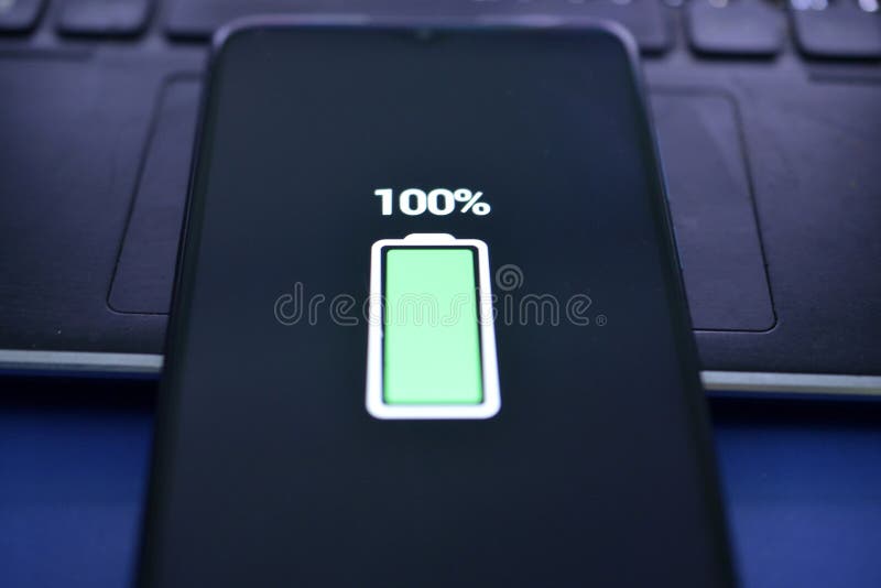 Close-up View of Smartphone Charging , Battery Level at Full Capacity ...