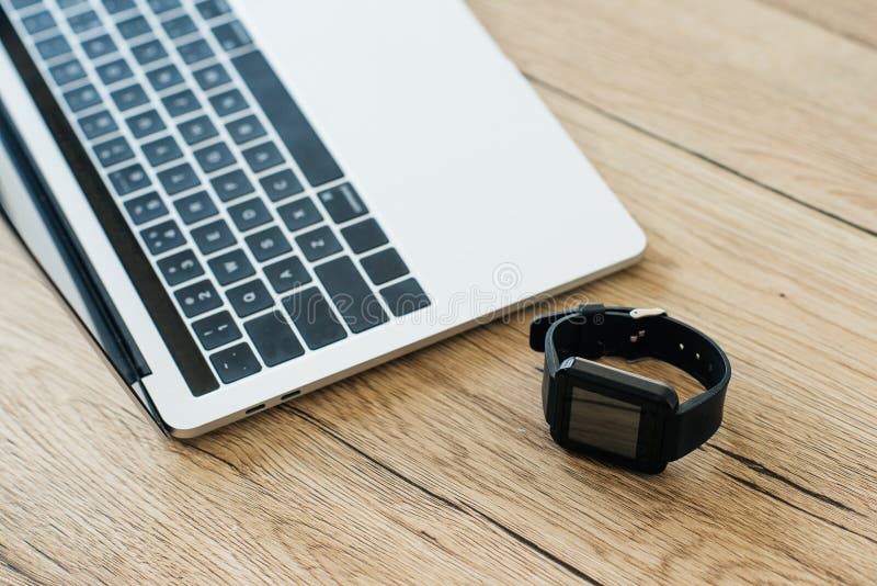 Close-up View of Smartwatch and Laptop Stock Photo - Image of ...