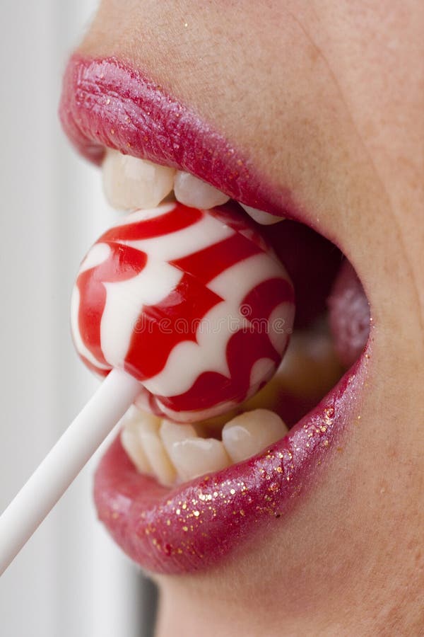 Red lips with lollipop stock photo. Image of pink, teeth - 105983372