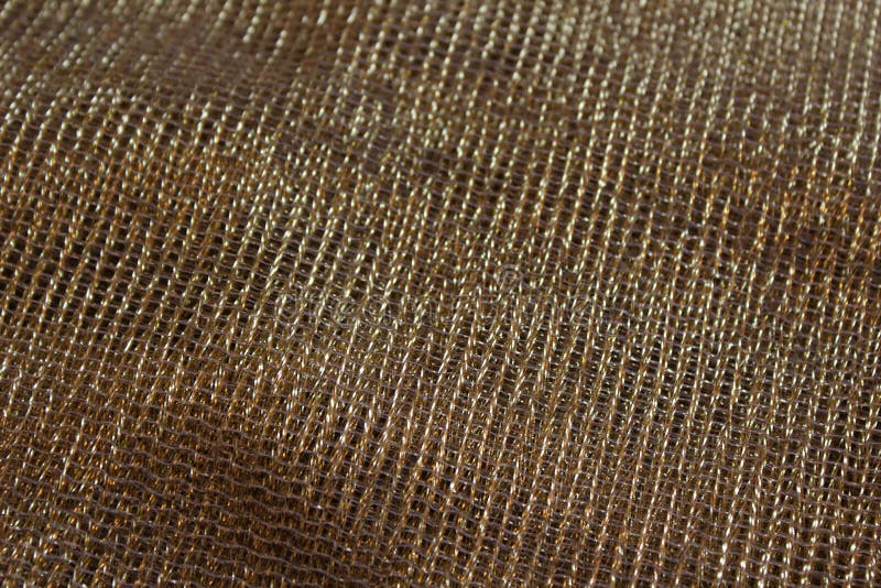 Gold colored mesh fabric stock image. Image of apparel - 134469547