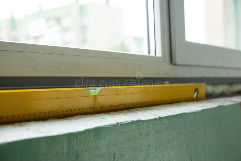 Close-Up View of a Spirit Level Tool on a Window Ledge during Daytime ...