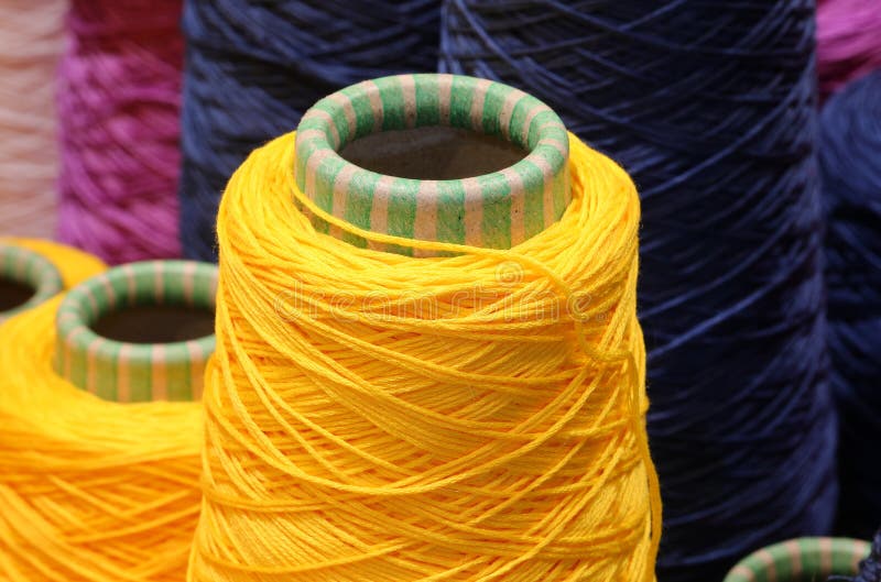 Close-up View of a Spool of Yellow Yarn Stock Photo - Image of cord ...