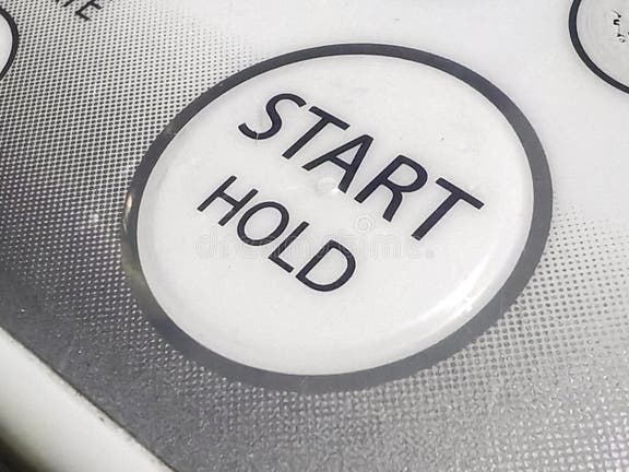 Close-up View of a "START HOLD" Button on a Control Panel Stock Photo ...