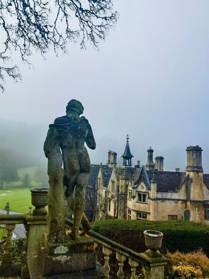 Close-up View of a Stone Statue in Front of an Ancient Castle Stock ...