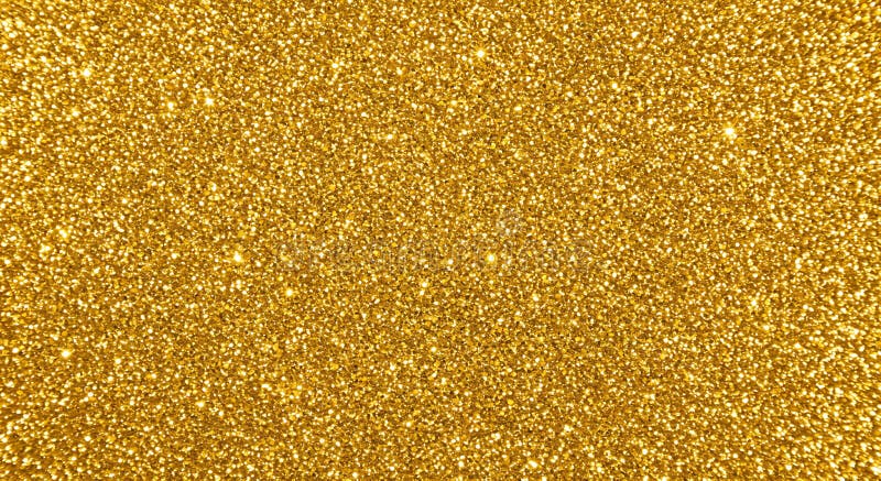 A Close-up View of a Surface Covered in Fine, Shiny Gold Glitter. the ...