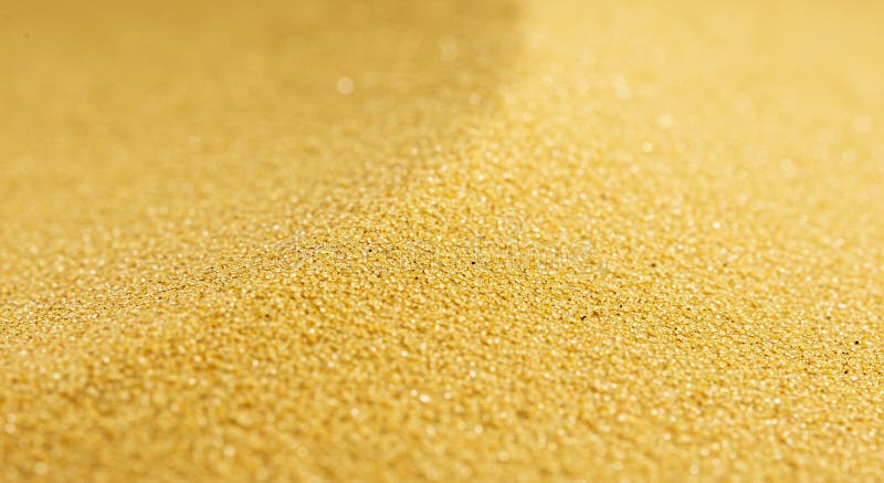 Close-up View of a Surface Densely Covered with Fine, Golden Sand ...
