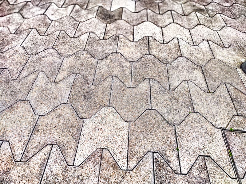 Close Up View of a Textured Concrete Pavement with an Interlocking ...