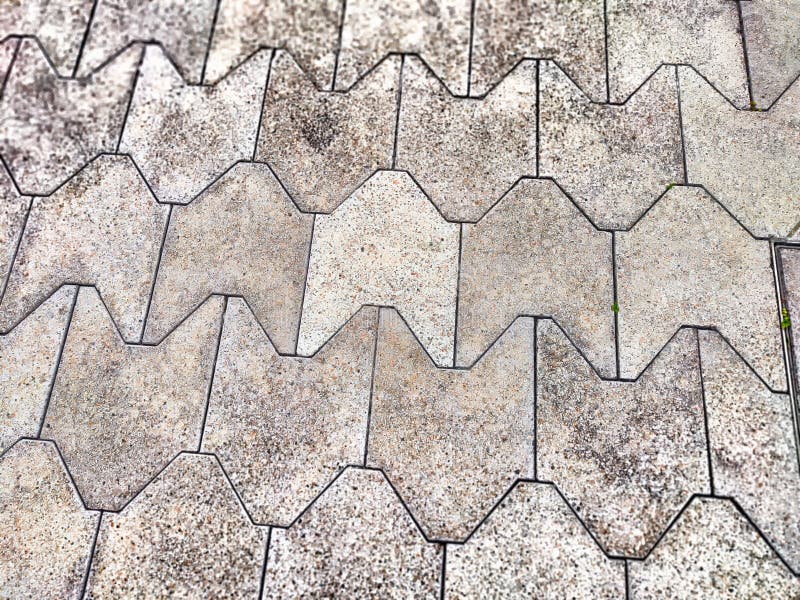Close Up View of a Textured Concrete Pavement with an Interlocking ...