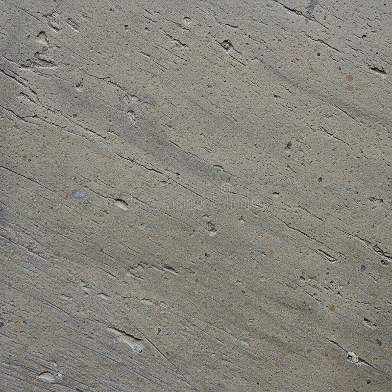 A Close-up View of a Textured Concrete Surface, Featuring Linear ...