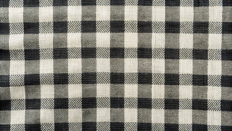 Close-up View of a Textured Fabric with a Black and White Checkered ...