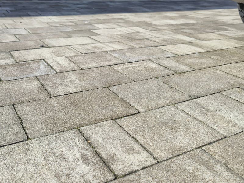 Close-up View of Textured Paving Stones on a Sunlit Pathway, Showcasing ...