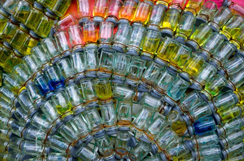 Close-Up View of Tiny Glass Bottles Wired Together Stock Image - Image ...