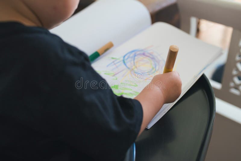 Toddler Using Crayons To Draw a Picture Stock Photo - Image of creative ...