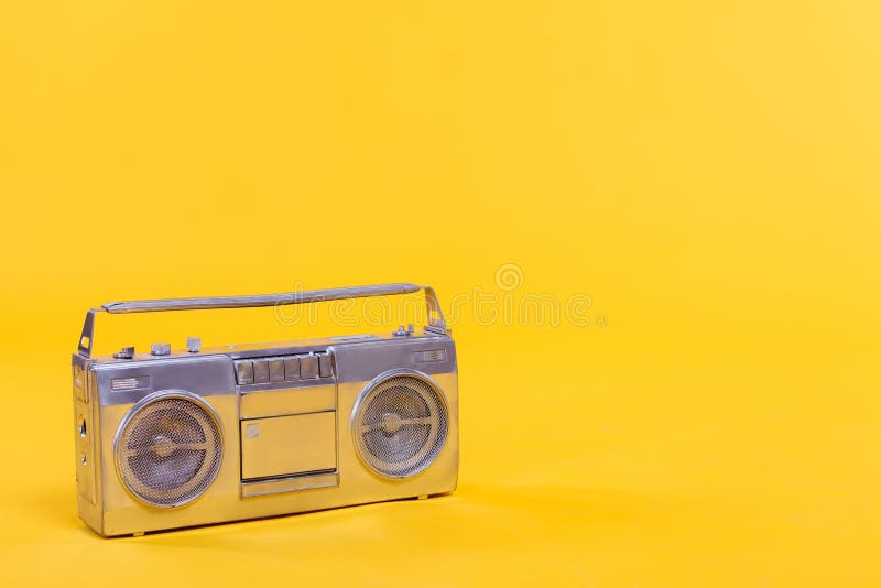 Close-up View of Trendy Silver Tape Recorder on Yellow Stock Photo ...