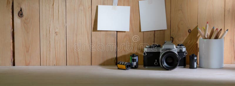 Close Up View of Trendy Workspace with Camera, Stationery, Notepad and ...