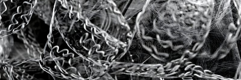 Close Up View of Twisted and Tangled Clear Plastic Material with a Dark ...