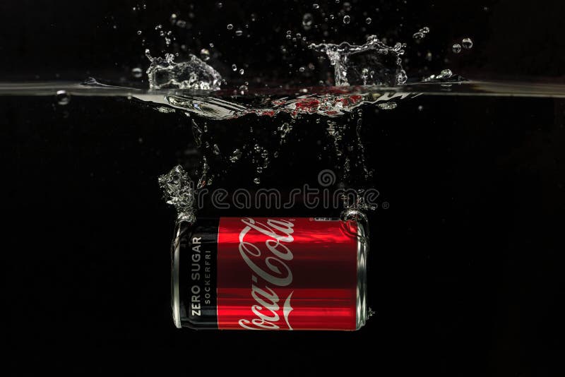 Close Up View of Two Cans Falling in Water. Coca Cola Editorial Image ...