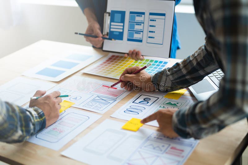 Close Up View of UI Developer Team Brainstorming on Their Project with ...
