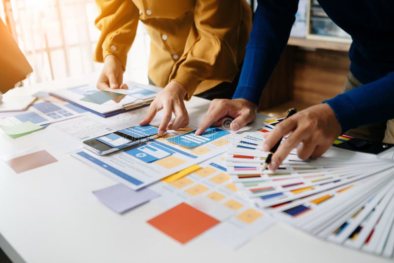 Close Up View of UI Developer Team Brainstorming on Their Project with ...